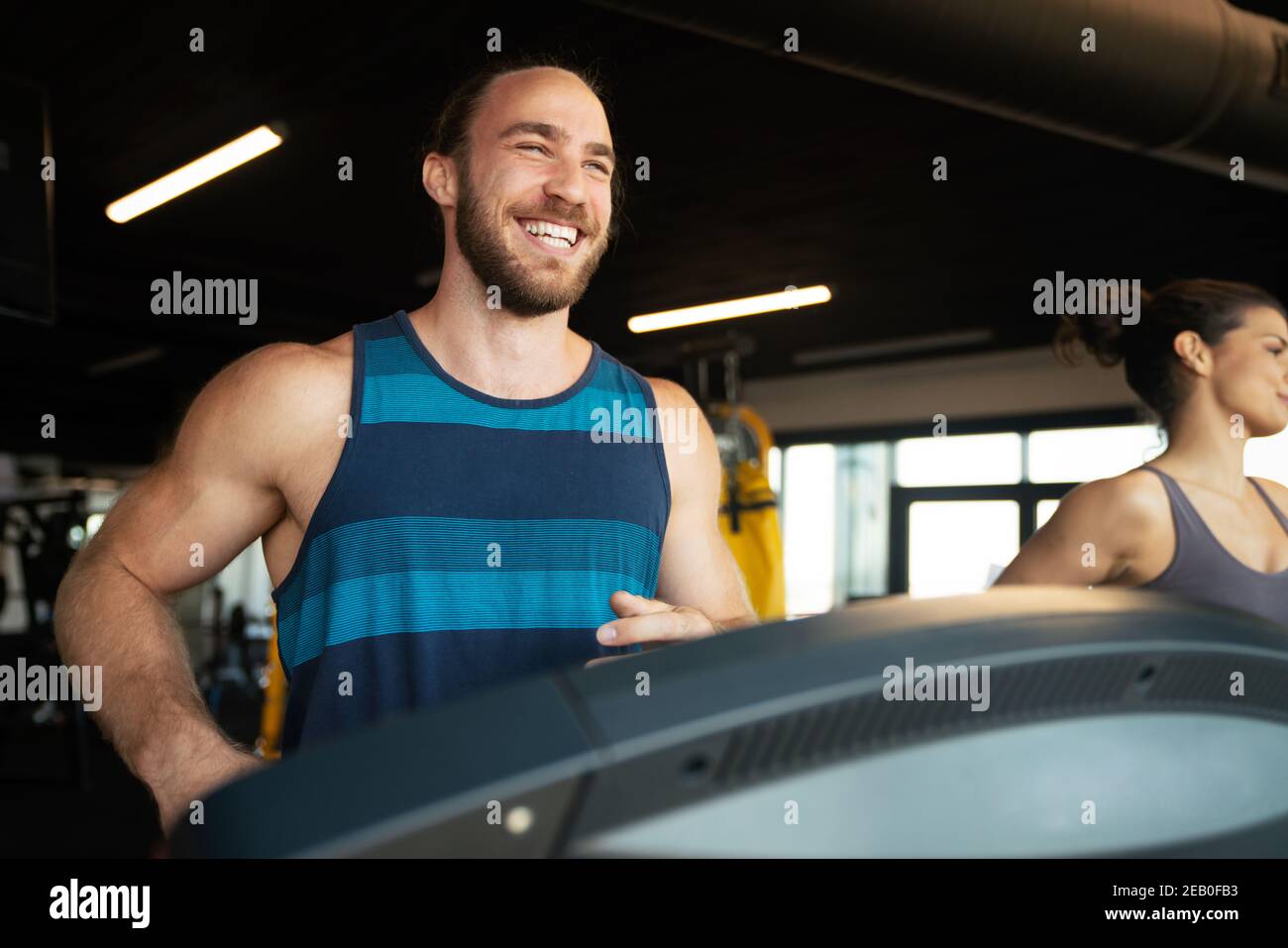 Group of young people running on treadmills in sport gym Stock Photo ...