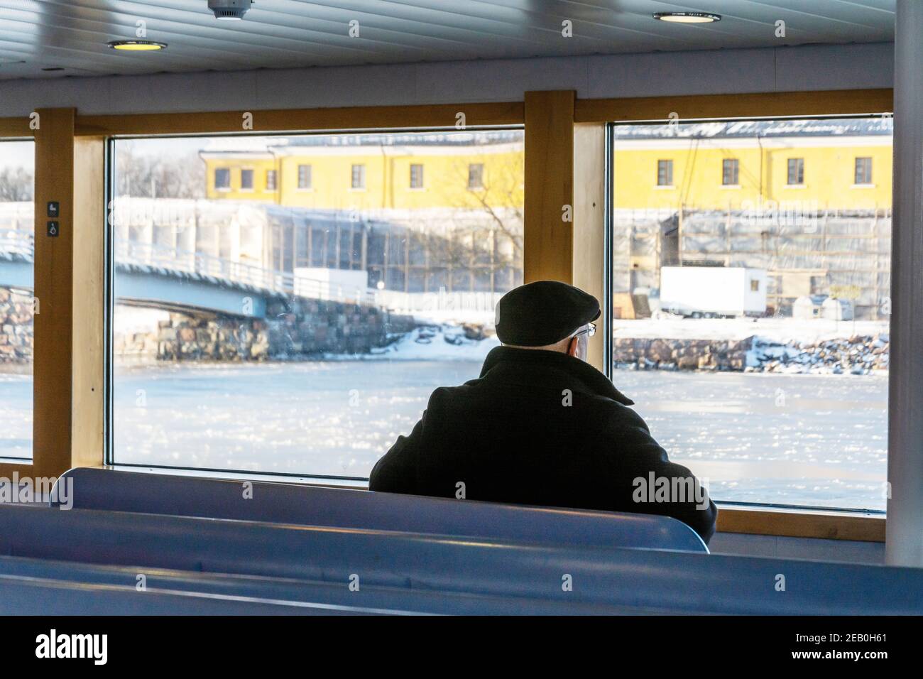 Man sitting in Suomenlinna Ferry in Helsinki Finland Stock Photo - Alamy