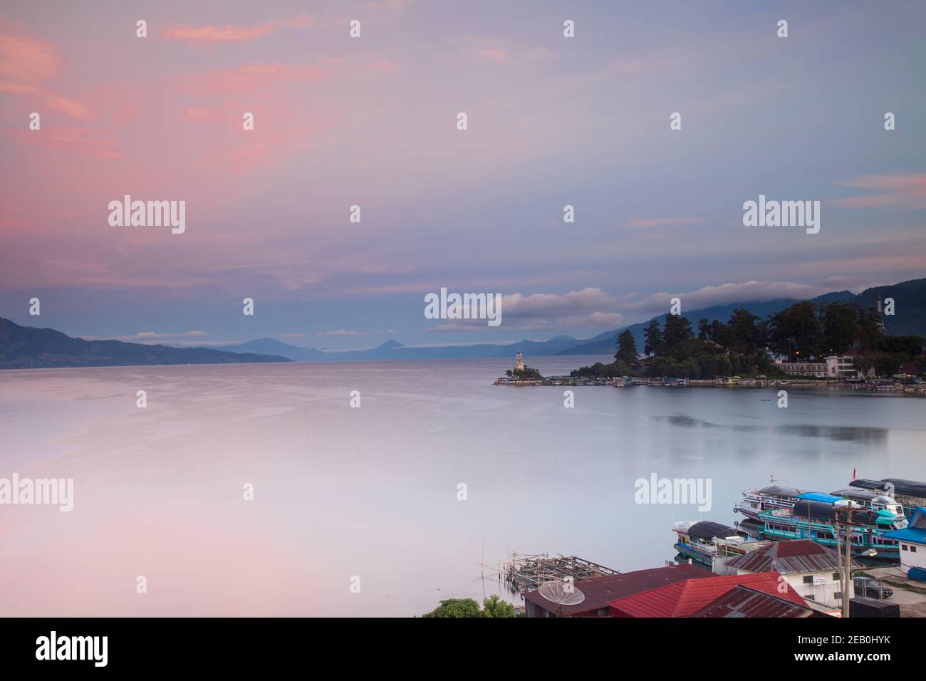Indonesia, Sumatra, Samosir Island, Lake Toba, View of Parapat at dawn ...