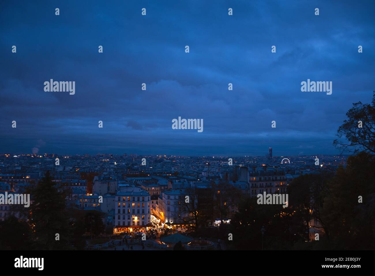 Paris night view from Montmartre hill. Beautiful evening blue hour ...