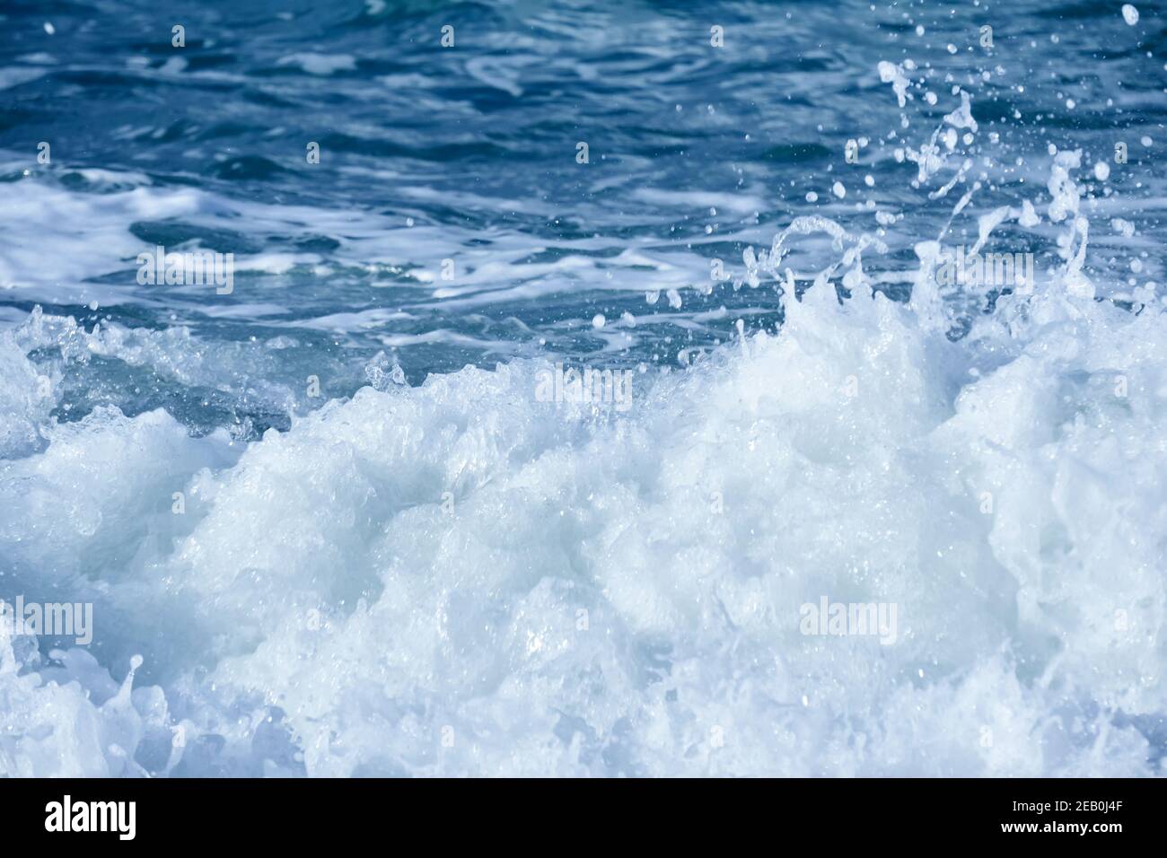 foam splash sea surf close up Stock Photo - Alamy