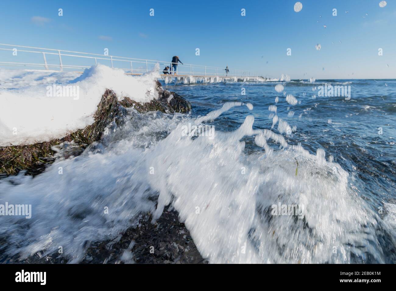 Frozen pier and snow in beach day time at Denmark Stock Photo - Alamy