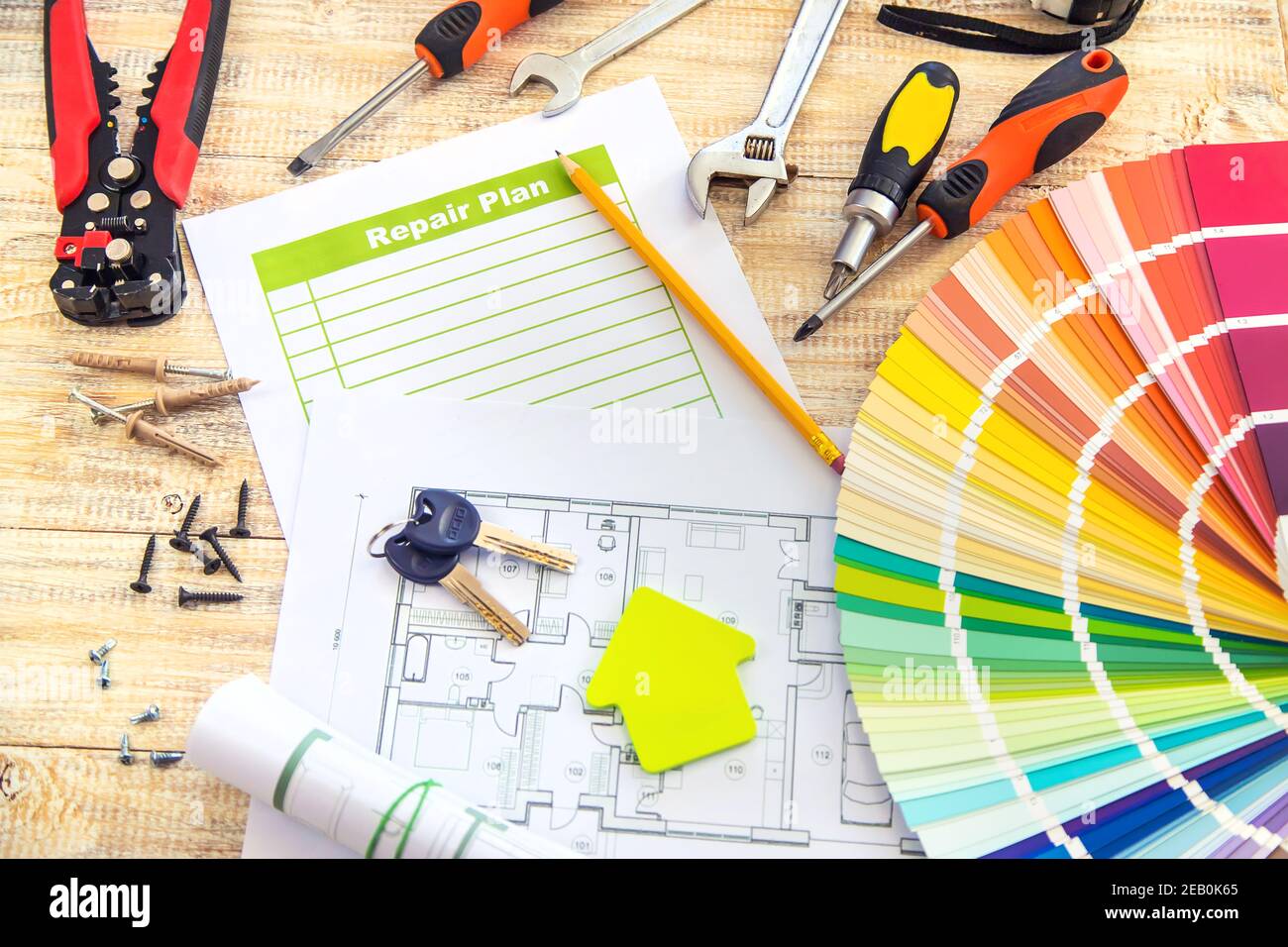 Paint palette house plan and repair tools. Selective focus. Color Stock ...