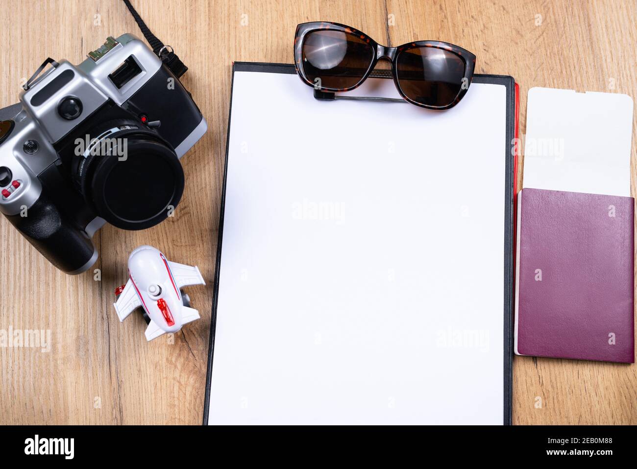 Tourism and travel concept. White empty folder sheet, passport with ...