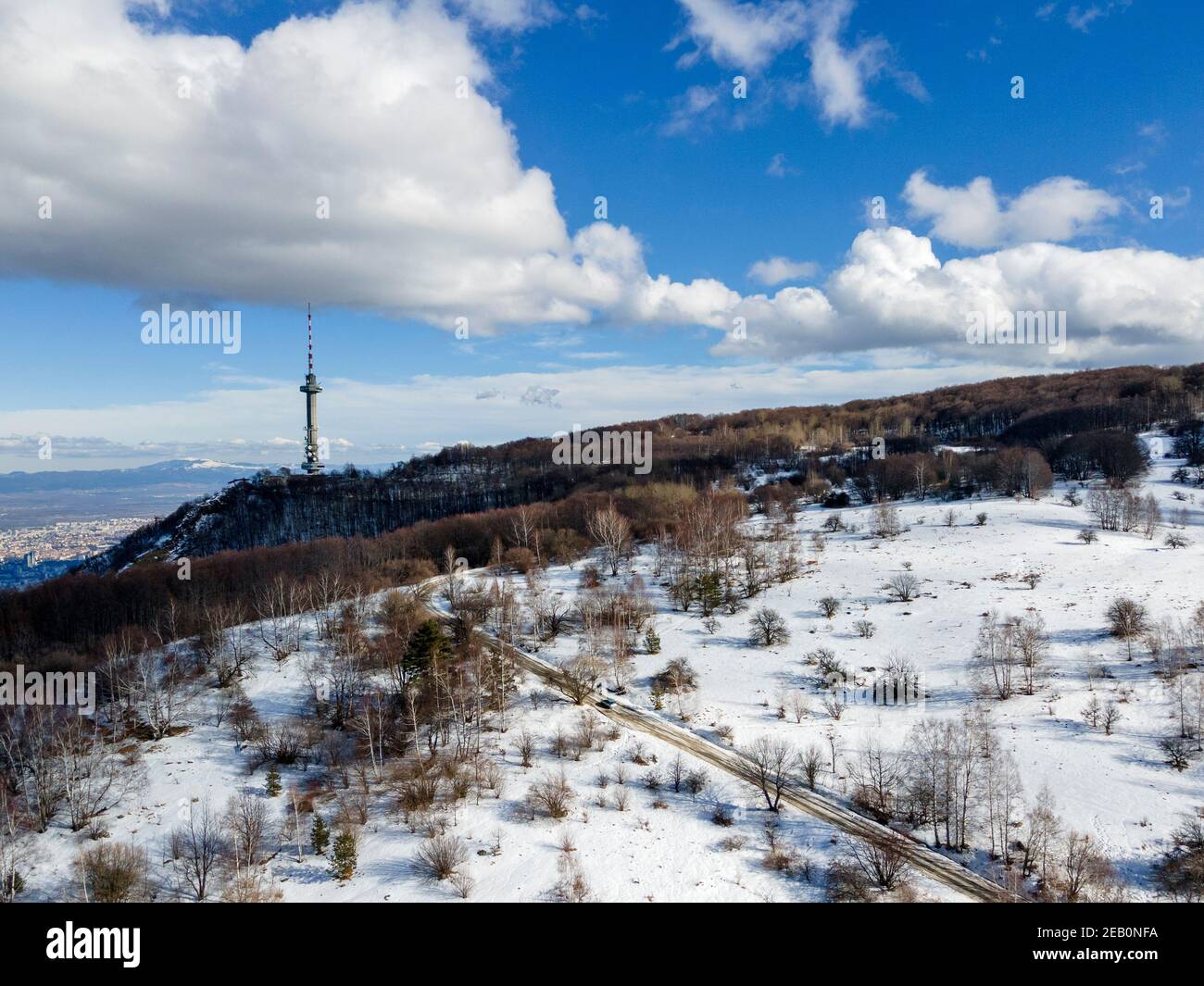 Aerial Winter view of Kopitoto tower at Vitosha Mountain and city of ...