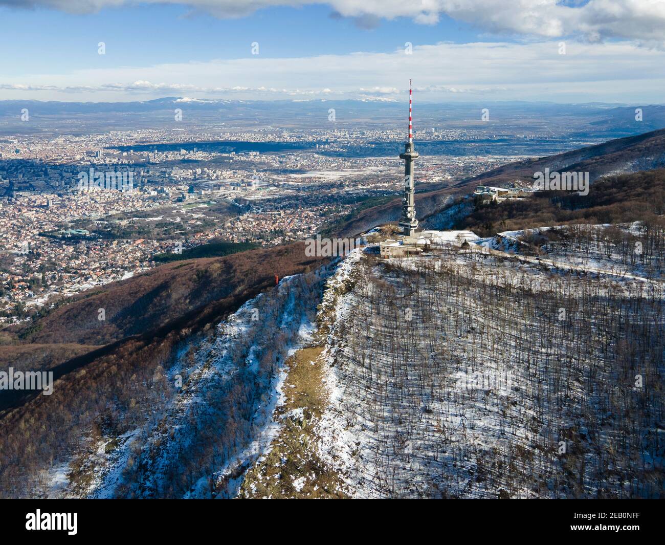 Aerial Winter view of Kopitoto tower at Vitosha Mountain and city of ...