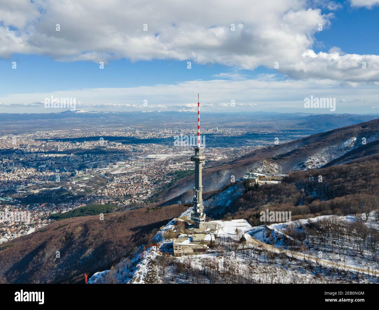 Aerial Winter view of Kopitoto tower at Vitosha Mountain and city of ...