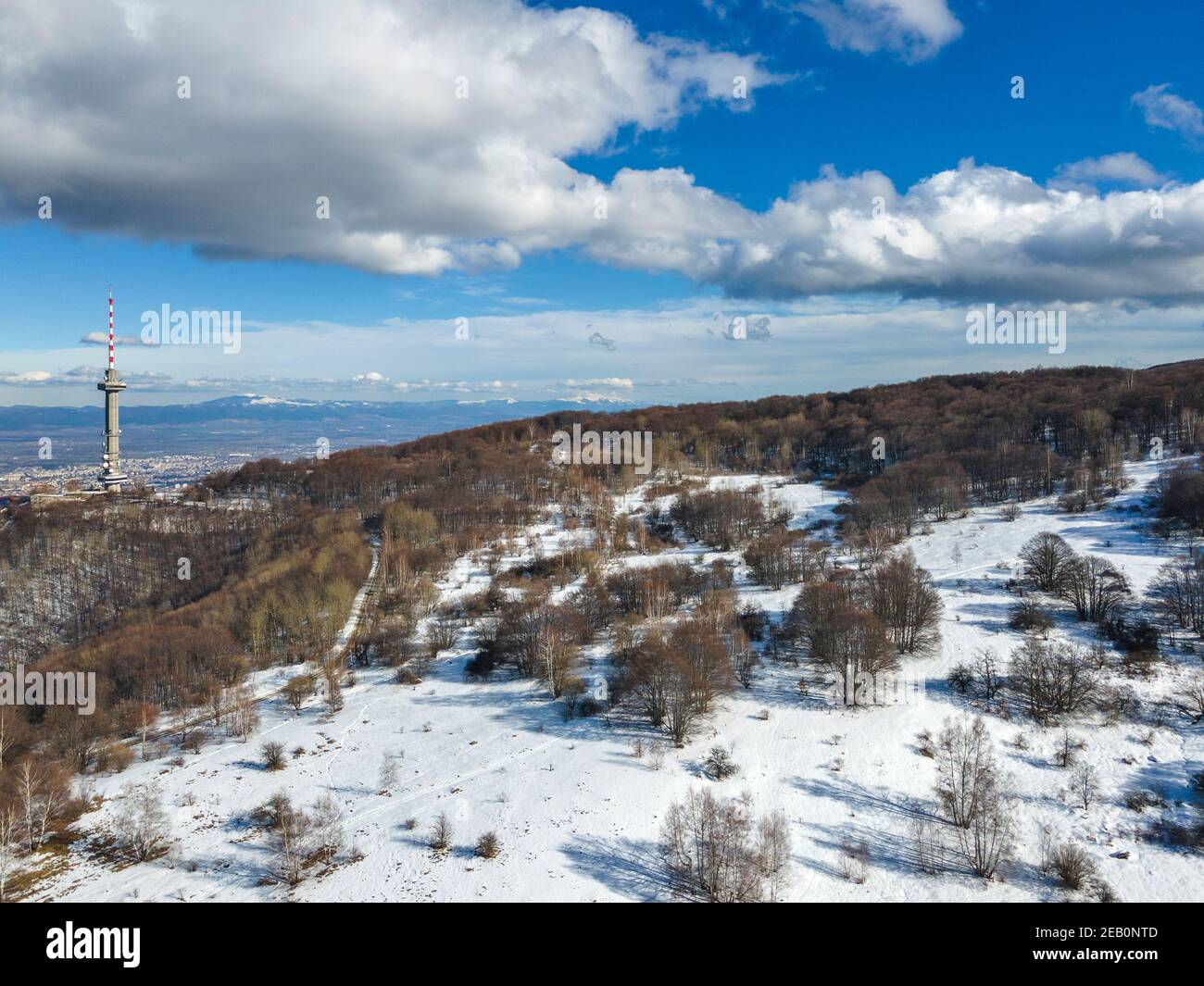 Aerial Winter view of Kopitoto tower at Vitosha Mountain and city of ...