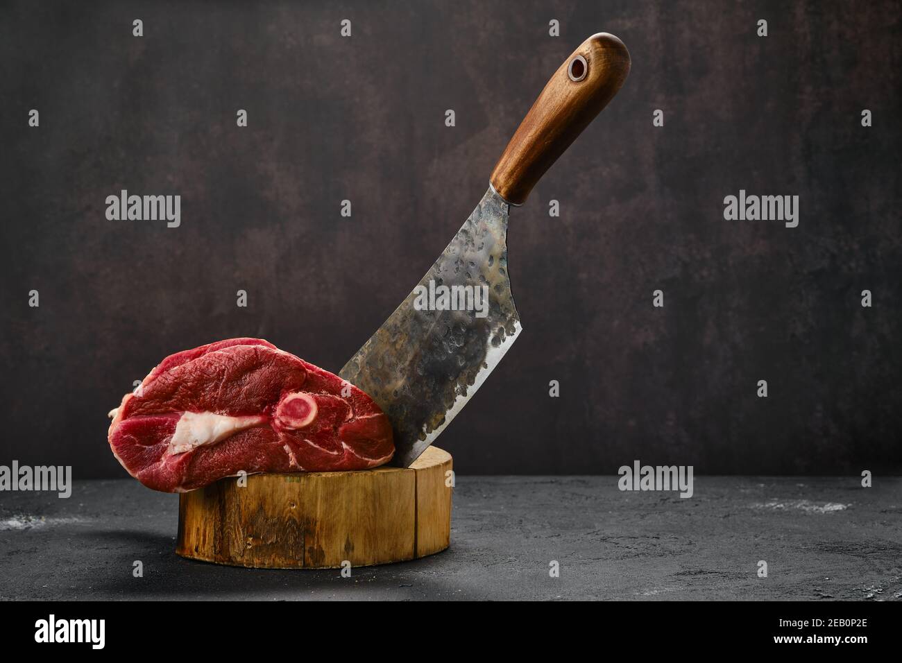 Raw fresh lamb leg and butcher cleaver Stock Photo - Alamy