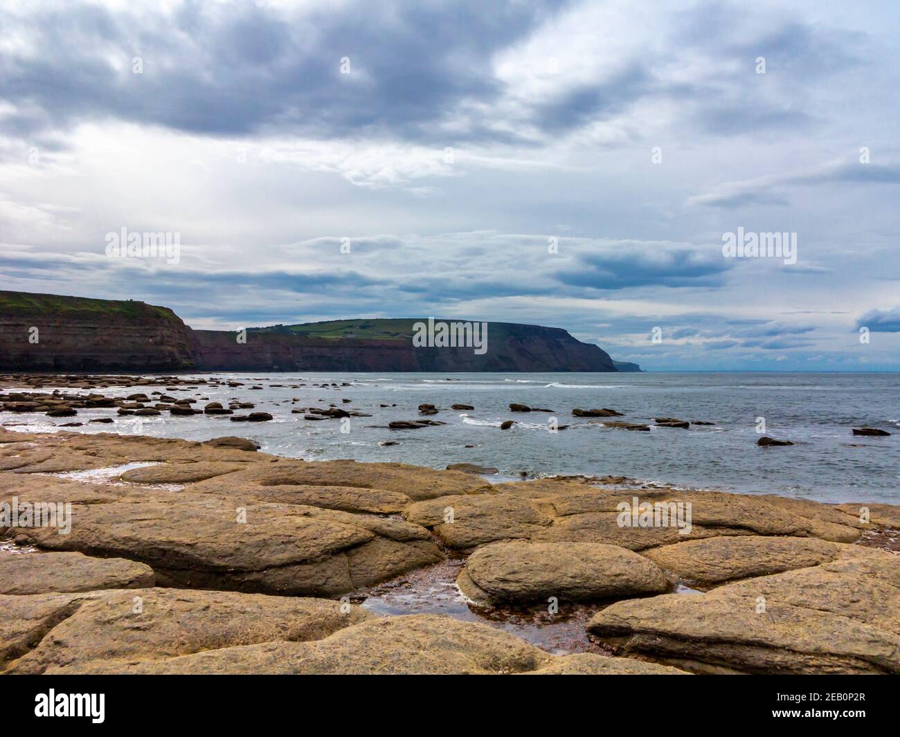 Rock pools on the beach at Staithes a village on the North Yorkshire ...
