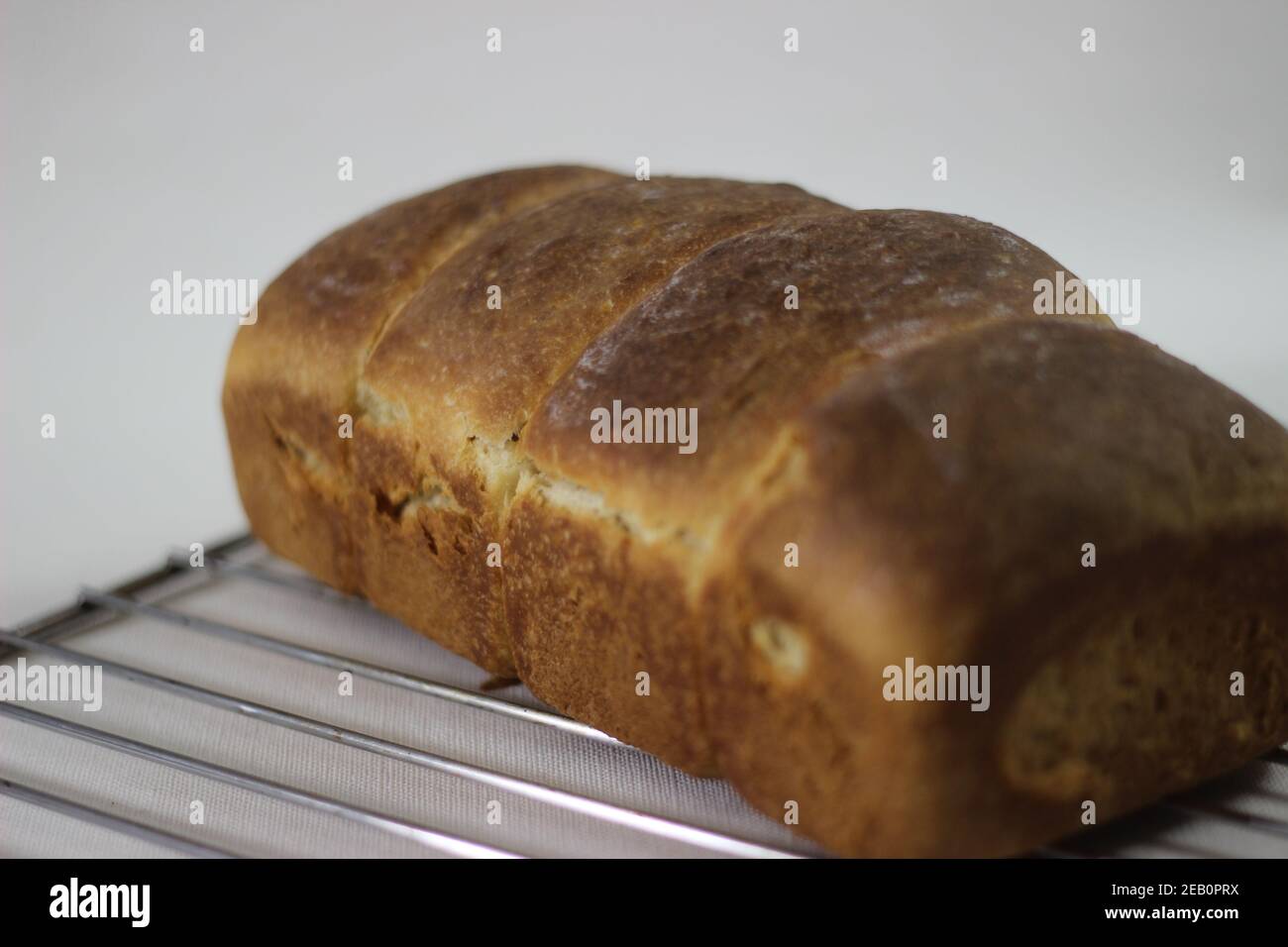 Home baked mini roll loaf bread with broken bands of rolls visible ...