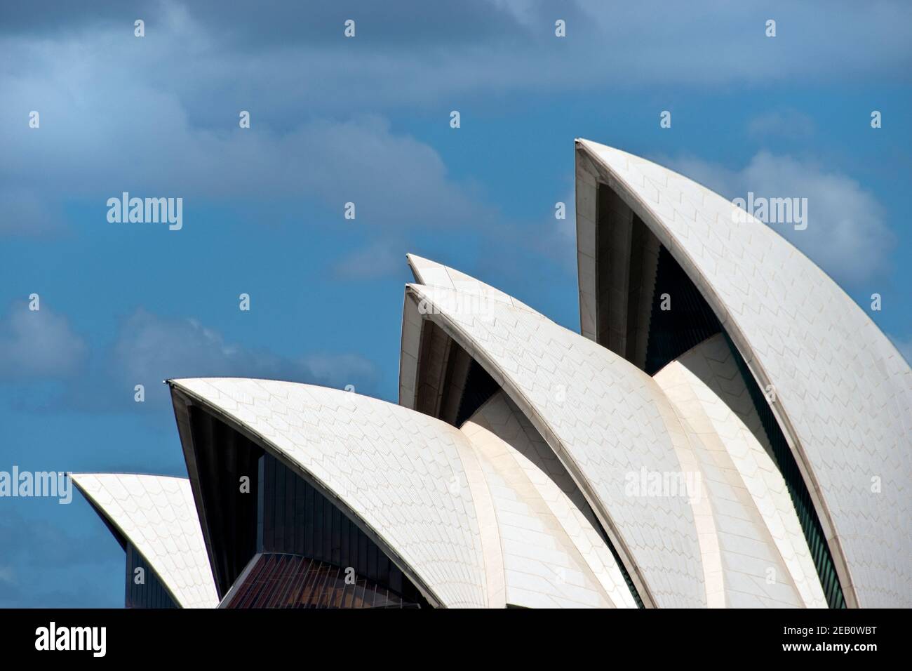 The “shells” of the Sydney Opera House, covered with white tiles ...