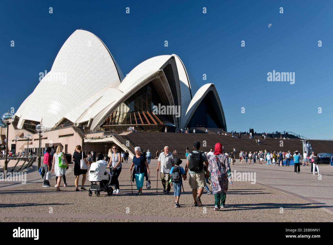The Sydney Opera House performing arts center at Sydney Harbor, is a ...