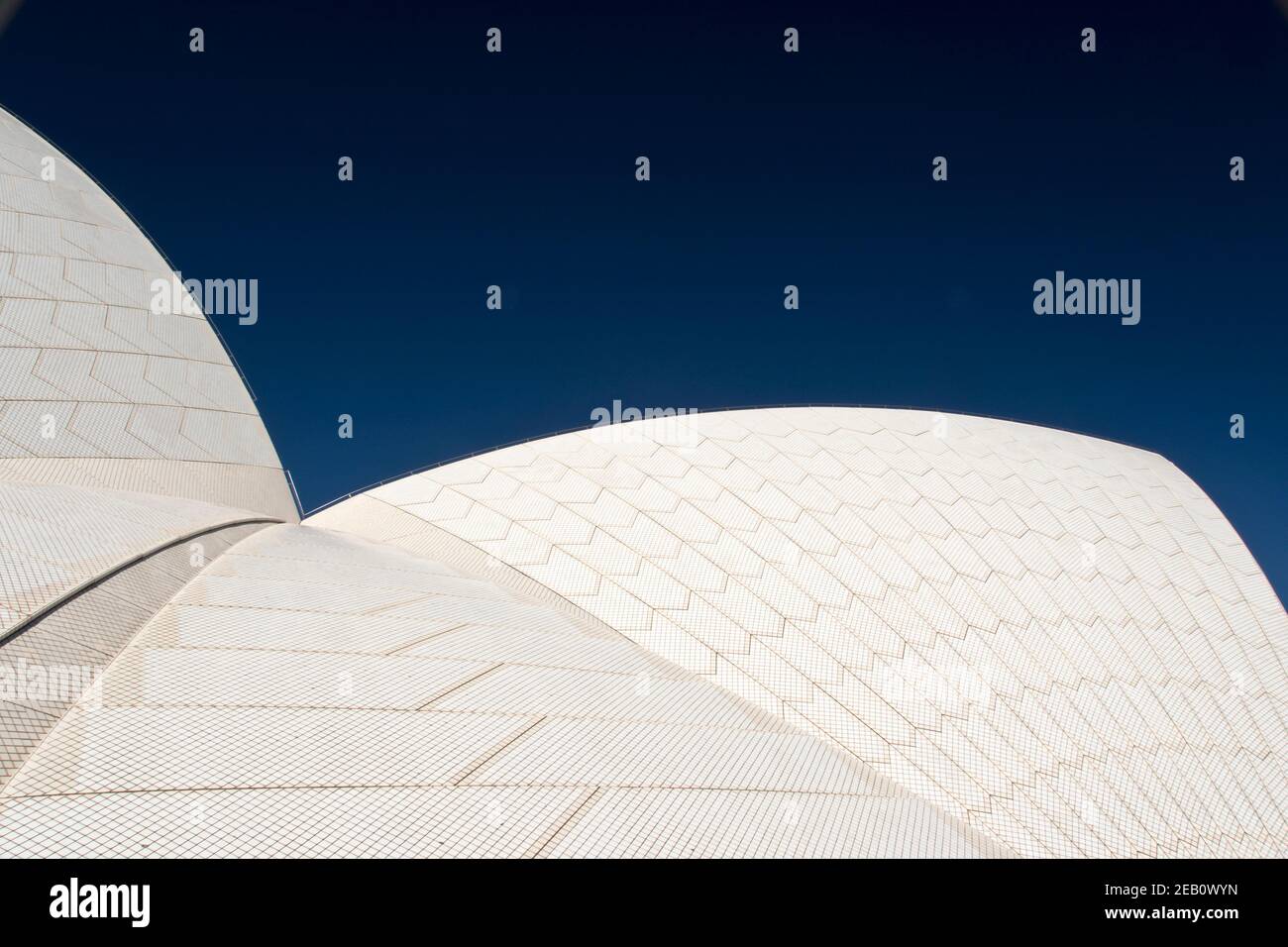 The “shells” of the Sydney Opera House, covered with white tiles ...