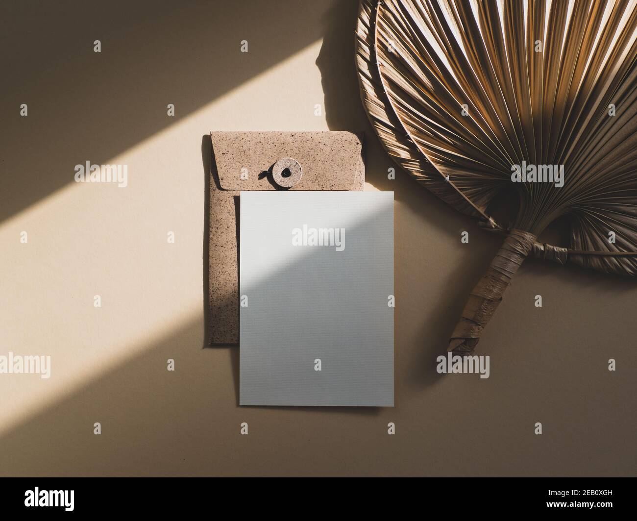 Blank, white, empty uncoated paper card isolated on beige boho style ...