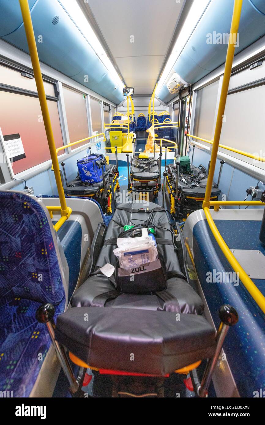 A Patient Transport Service bus parked in Camberwell bus garage Stock ...