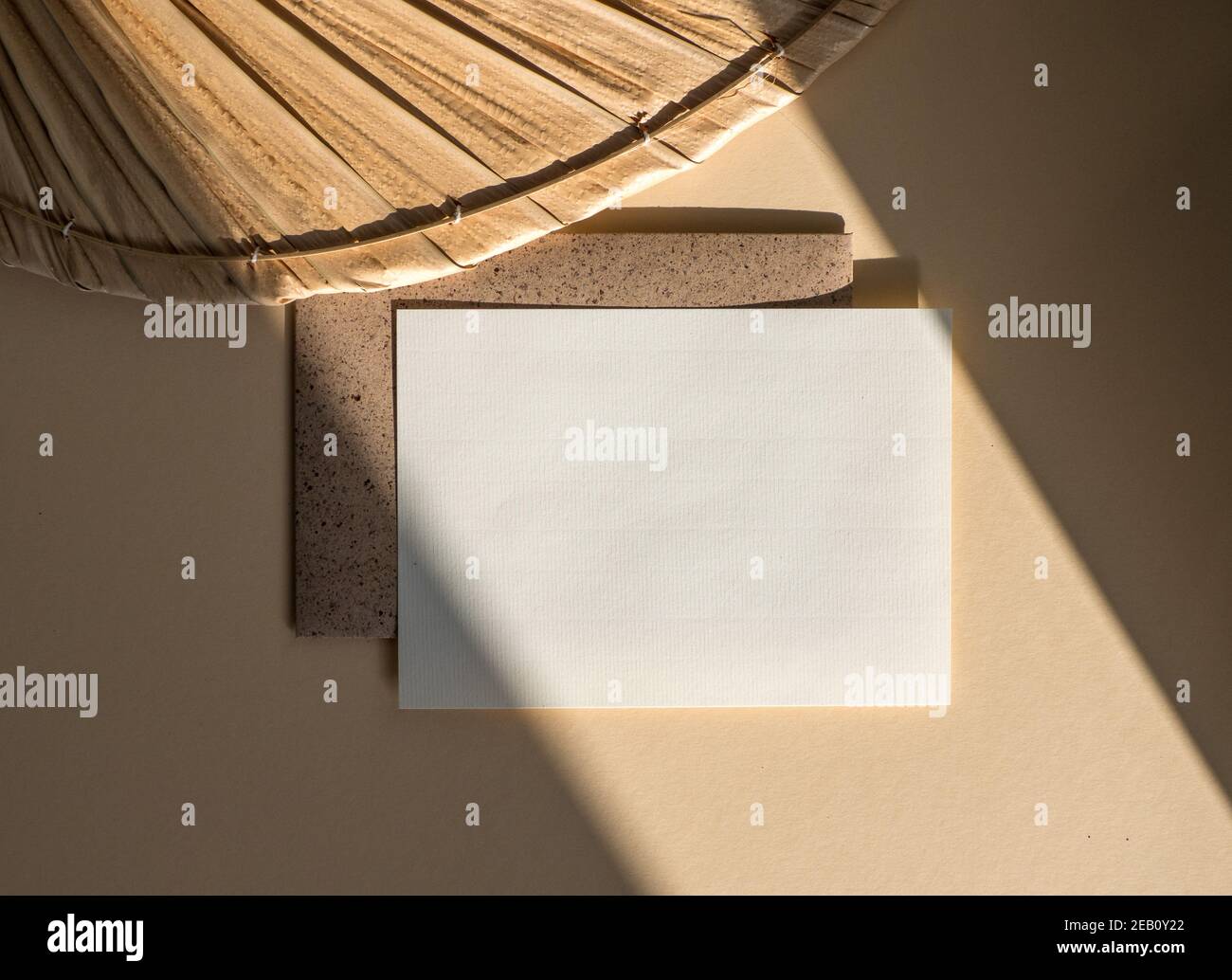 Blank, white, empty uncoated paper card isolated on beige boho style ...