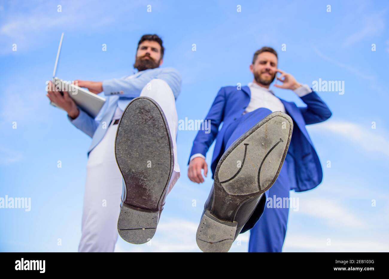 Businessmen making step bottom view. Business technologies coming. Big ...