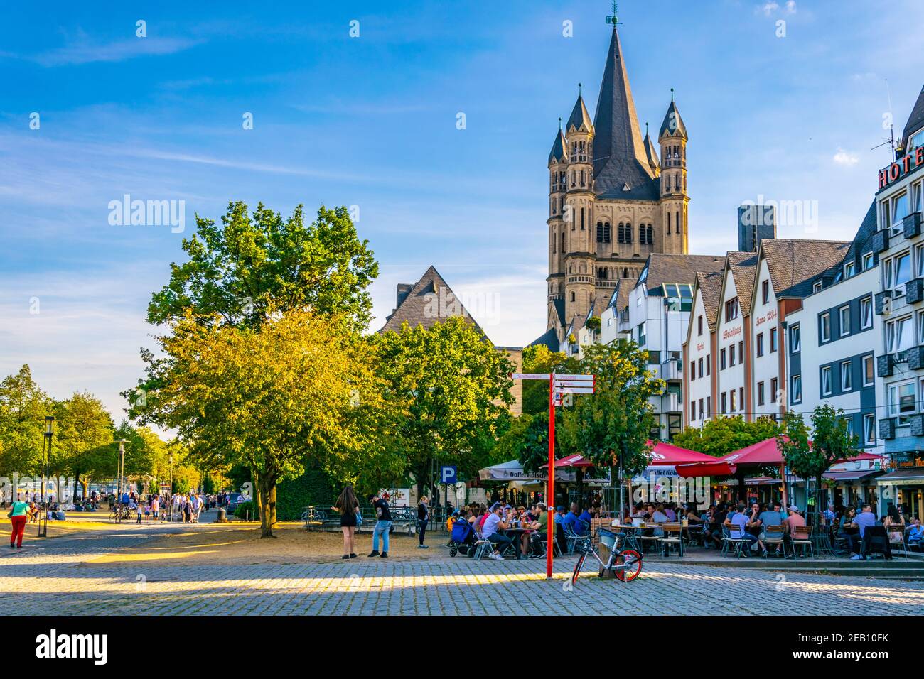COLOGNE, GERMANY, AUGUST 11, 2018: Riverside promenade and Saint Martin ...