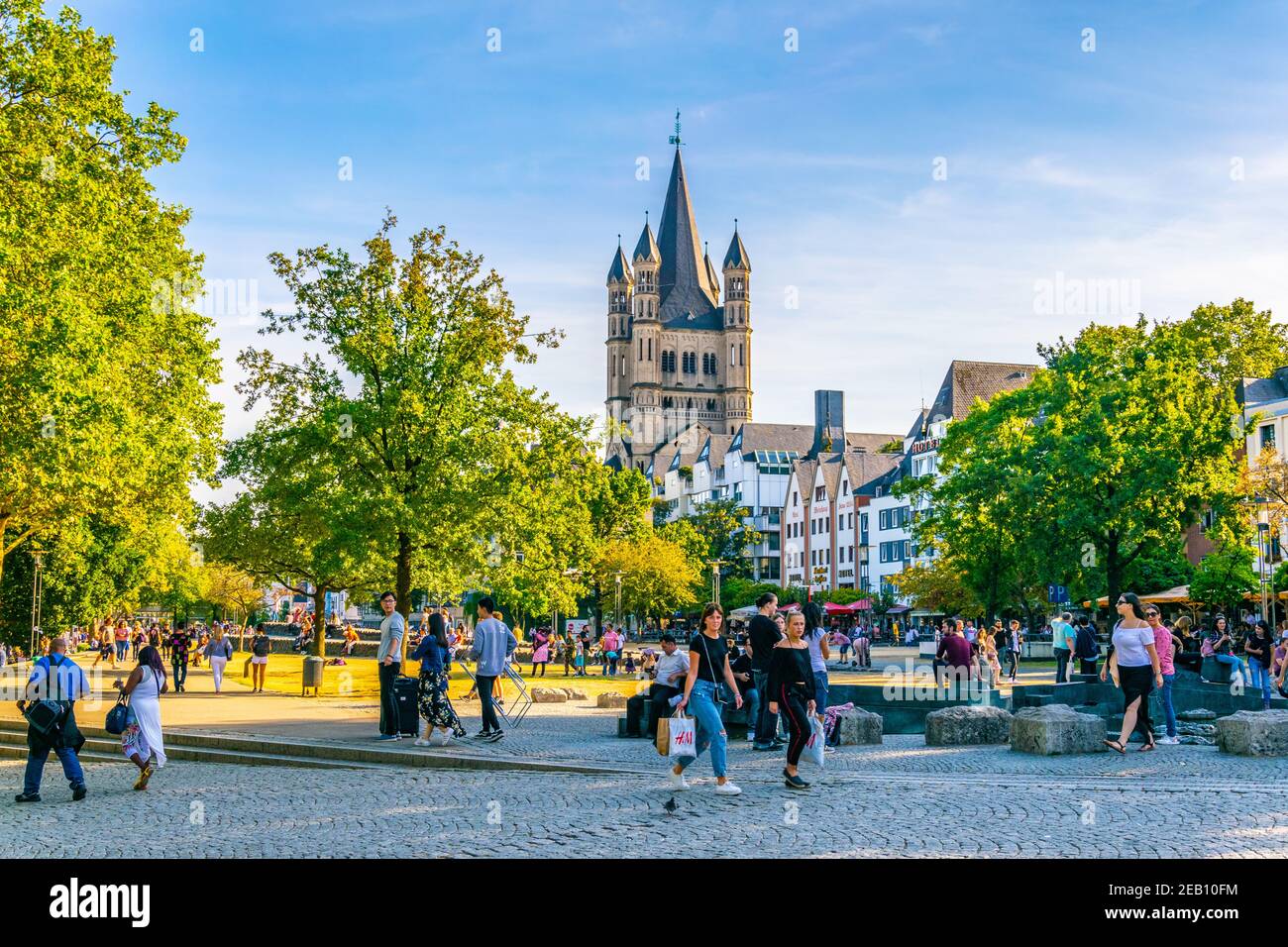 COLOGNE, GERMANY, AUGUST 11, 2018: Riverside promenade and Saint Martin ...