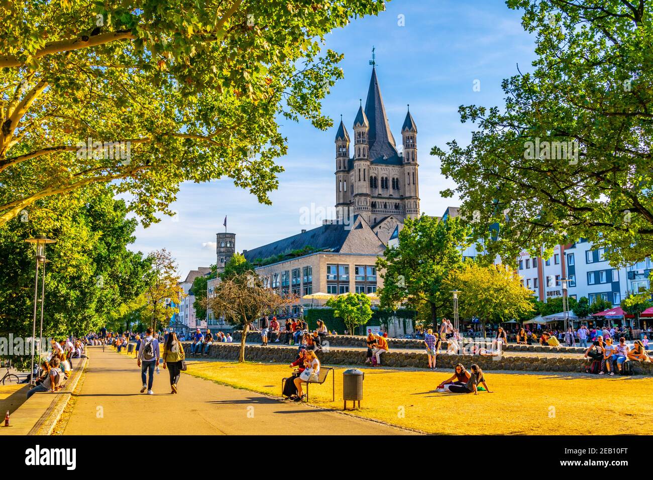 COLOGNE, GERMANY, AUGUST 11, 2018: Riverside promenade and Saint Martin ...