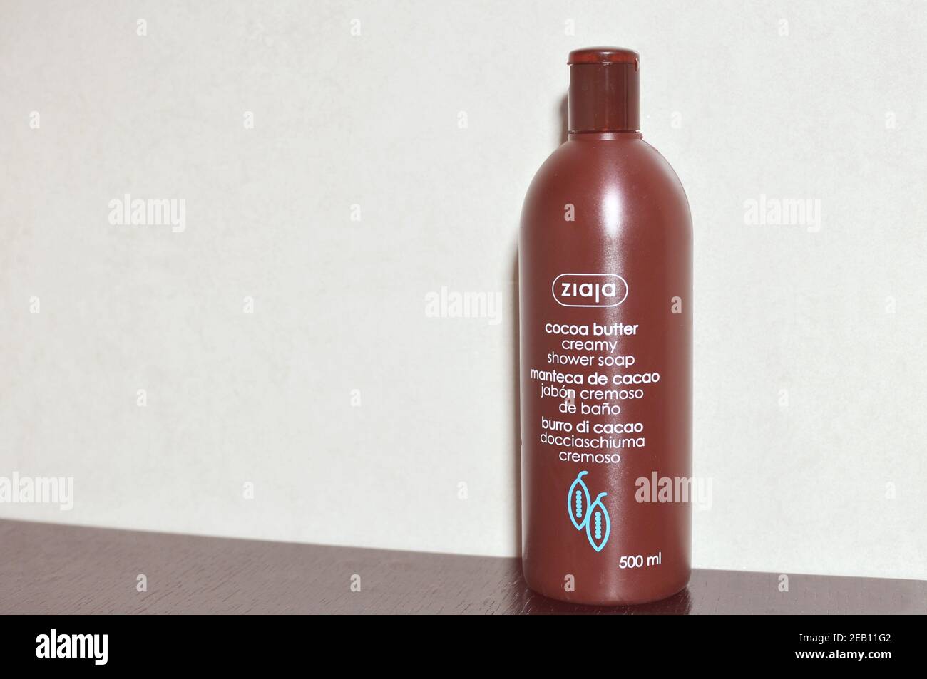 Close up of an cocoa shower gel bottle on white background with copy ...