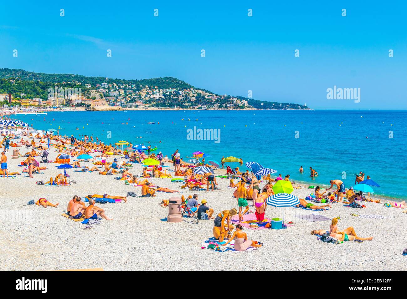 NICE, FRANCE, JUNE 11, 2017: People are enjoying summer on a beach in ...