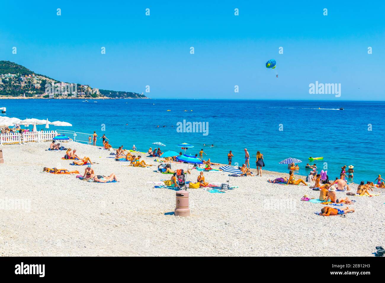 NICE, FRANCE, JUNE 11, 2017: People are enjoying summer on a beach in ...