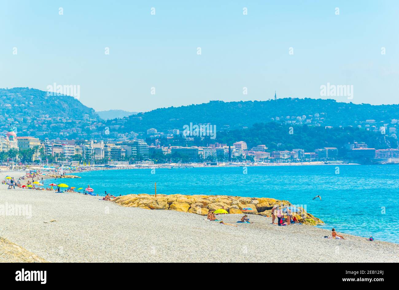 NICE, FRANCE, JUNE 12, 2017: People are enjoying summer on a beach in ...