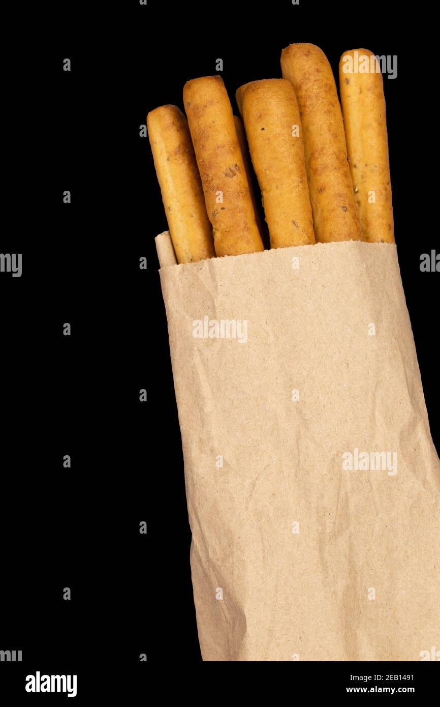 Crispy breadsticks. Traditional Italian snack, grissini on dark ...