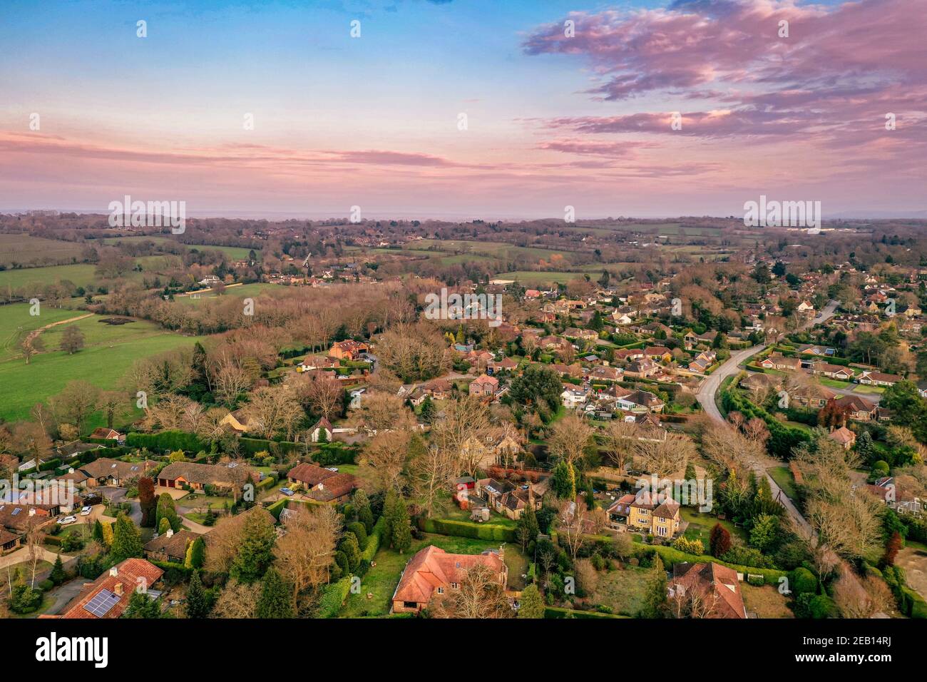 Aerial drone view of a rural village in West Sussex, England. Large ...