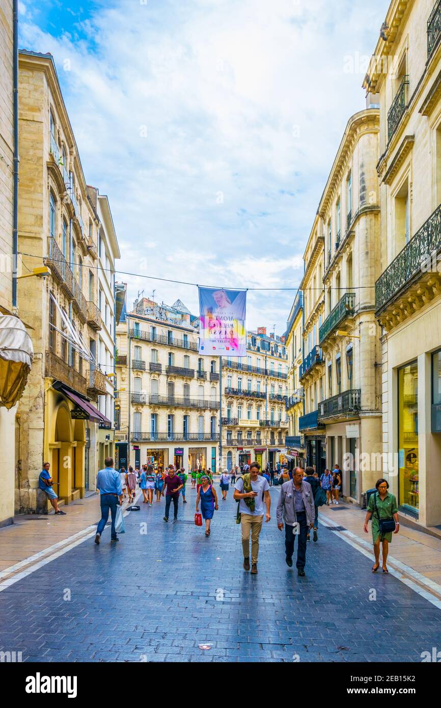 MONTPELLIER, FRANCE, JUNE 25, 2017: People are strolling through a ...