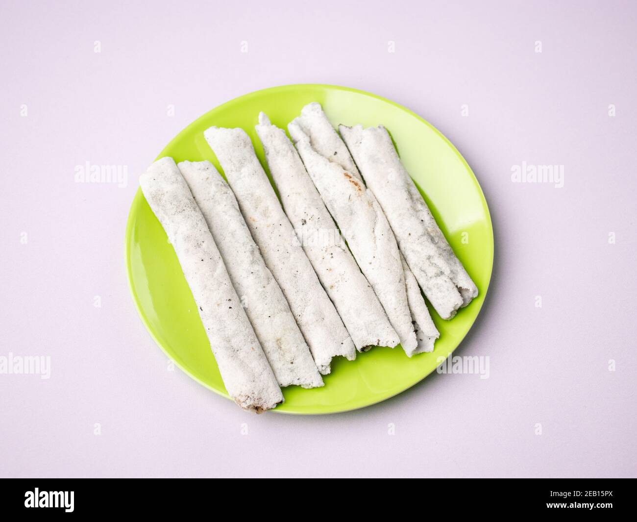 Til pitha a traditional food of Assam isolated stock image Stock Photo ...