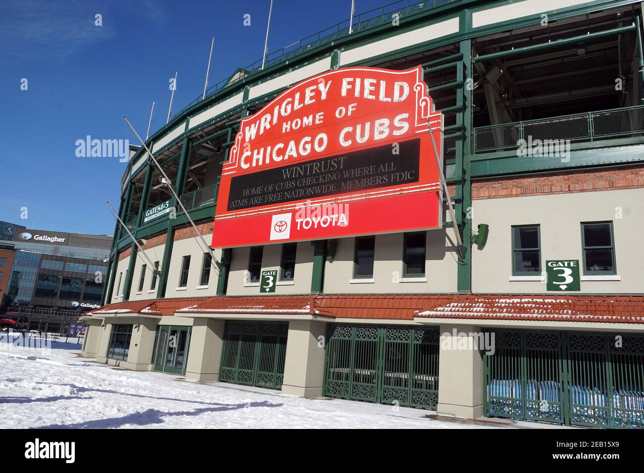 A general view of Wrigley Field and red marquee sign at main entrance ...