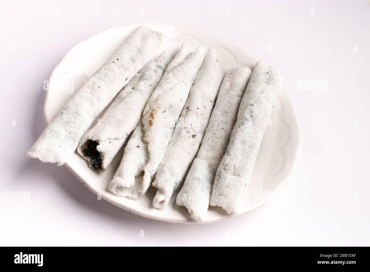 Til pitha a traditional food of Assam isolated stock image Stock Photo ...