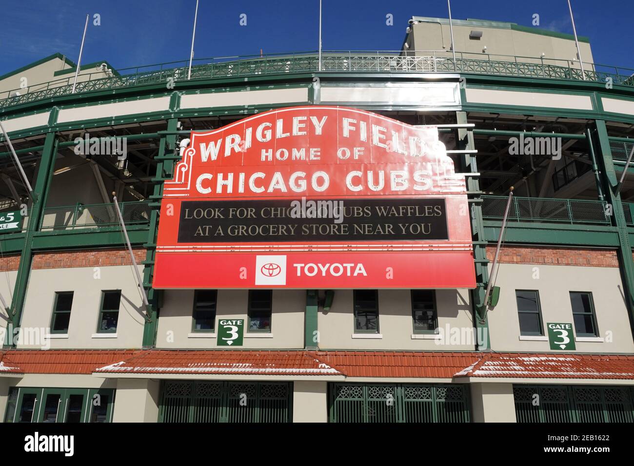 A general view of Wrigley Field and red marquee sign at main entrance ...