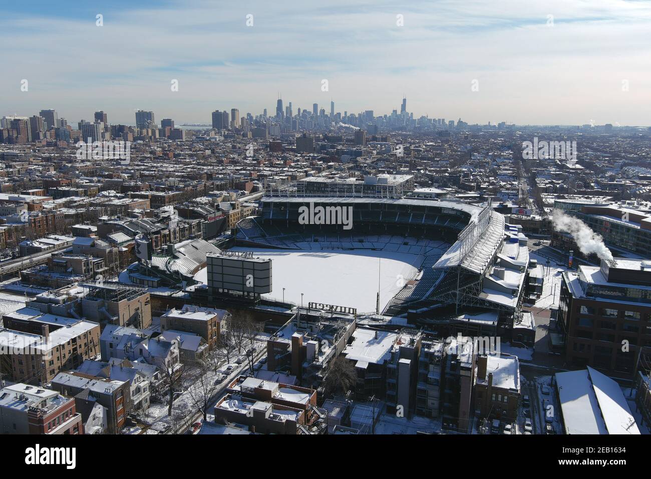 An aerial view of Wrigley Field and the downtown skyline, Sunday, Feb ...