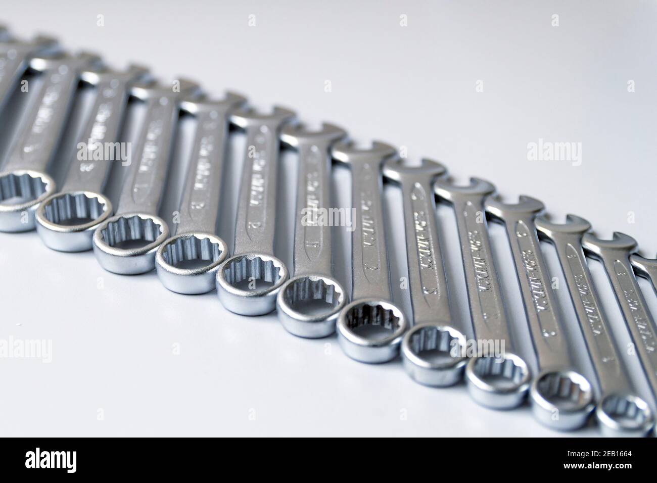 Cut-out wrenches horizontally placed from the biggest to the smallest ...