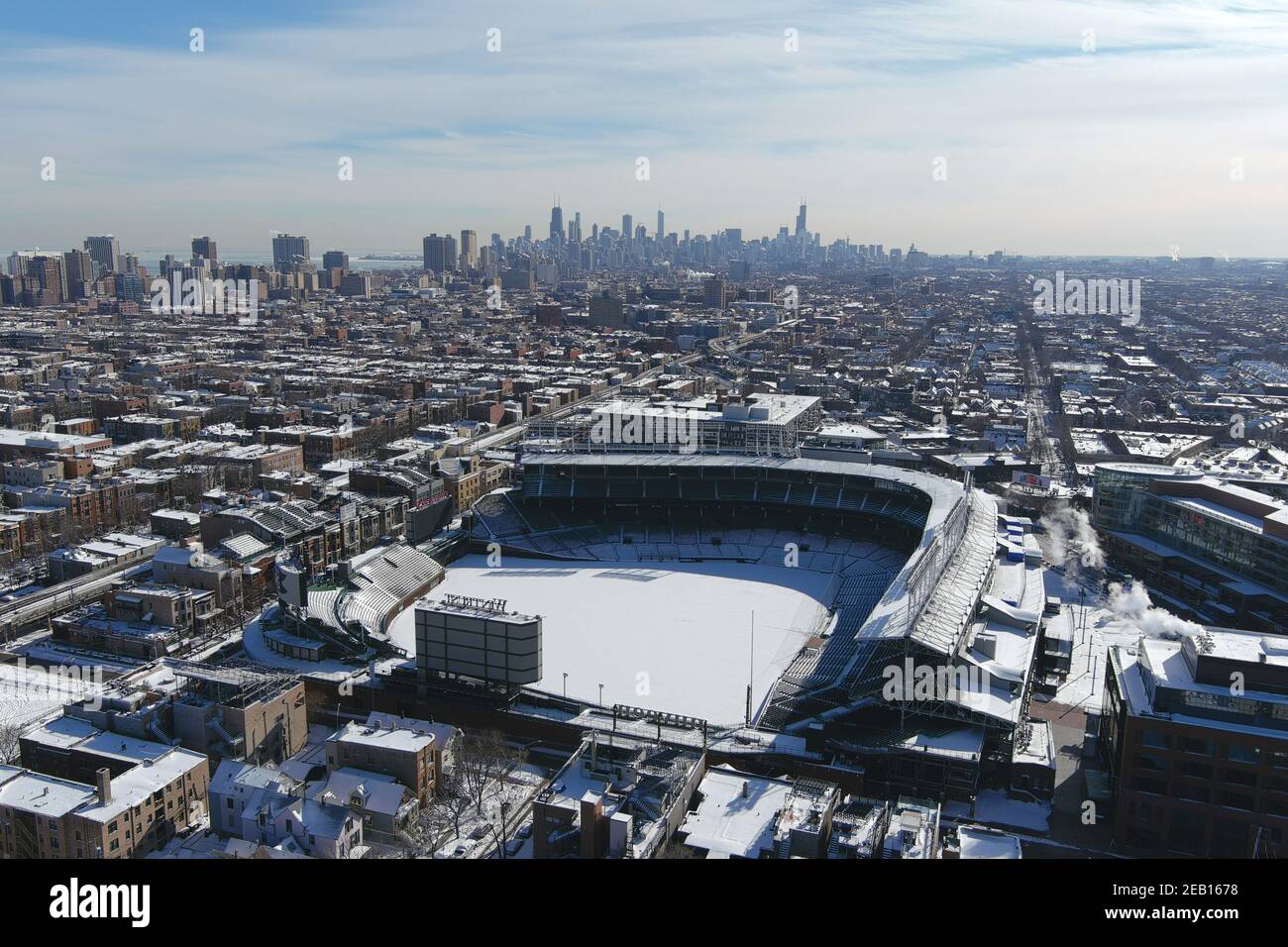 An aerial view of Wrigley Field and the downtown skyline, Sunday, Feb ...