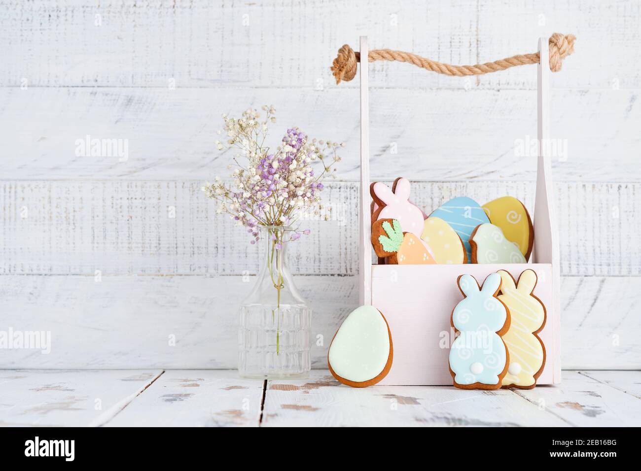 Easter greeting card with colorful colorful rabbits, eggs, chickens and ...