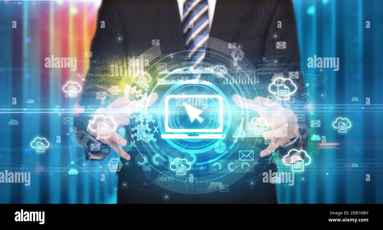 Businessman holding browsing icon in his hands with multiple technology ...