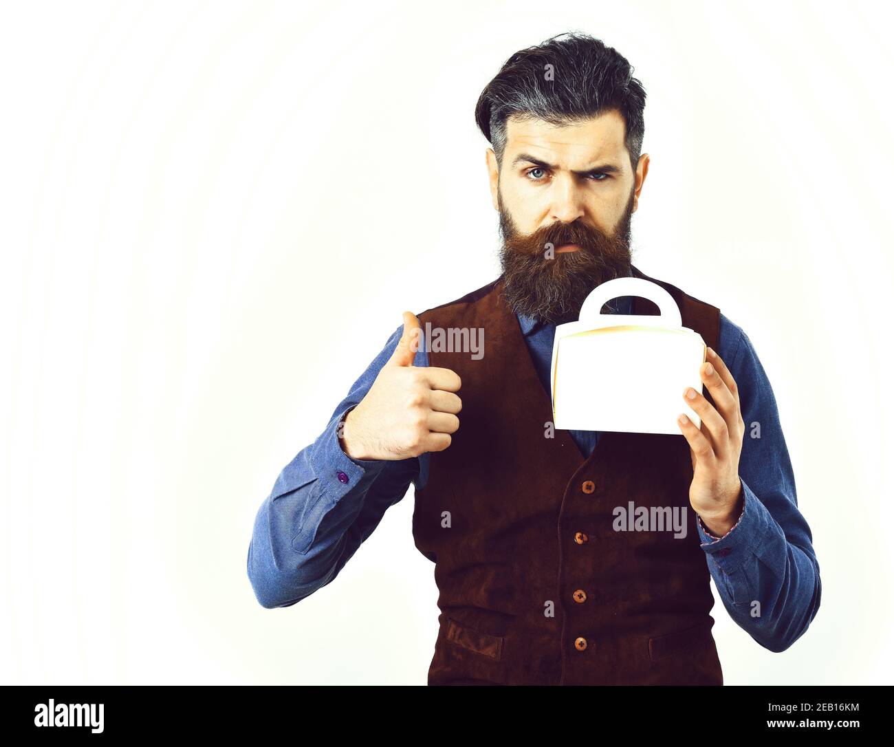 hipster with moustache holding lunch box with serious face isolated on ...
