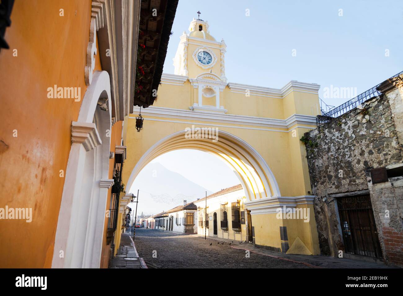 Famous Santa Catalina Arch and colonial houses in main avenue of ...