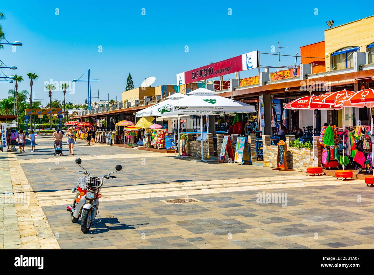 AGIA NAPA, CYPRUS, AUGUST 15, 2017: Street with plentiful tourist shops ...