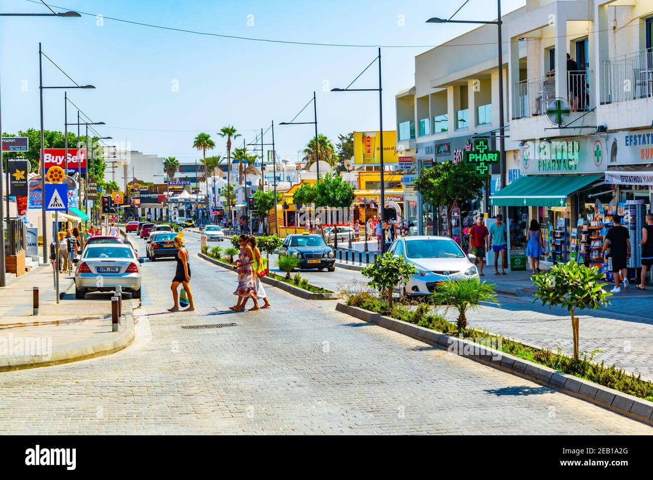 AGIA NAPA, CYPRUS, AUGUST 15, 2017: Street with plentiful tourist shops ...