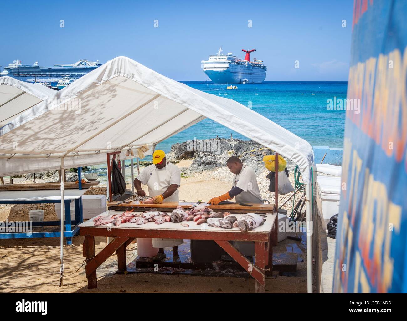 Man selling Fish At Fish Market , Cruise ship & Blue Caribbean Sea ...