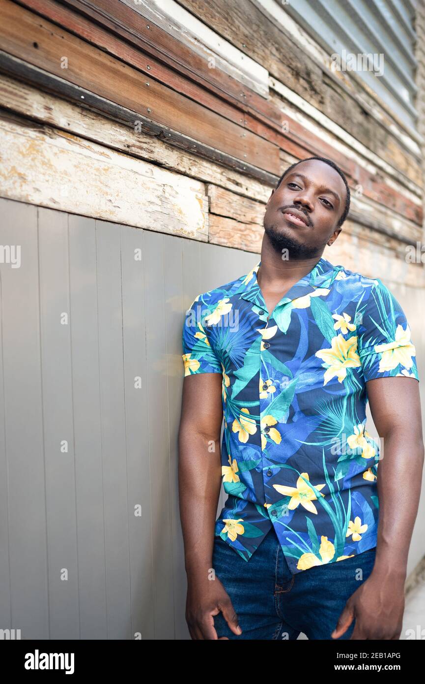 A young black man in street. Outdoor portrait of traveler Stock Photo ...