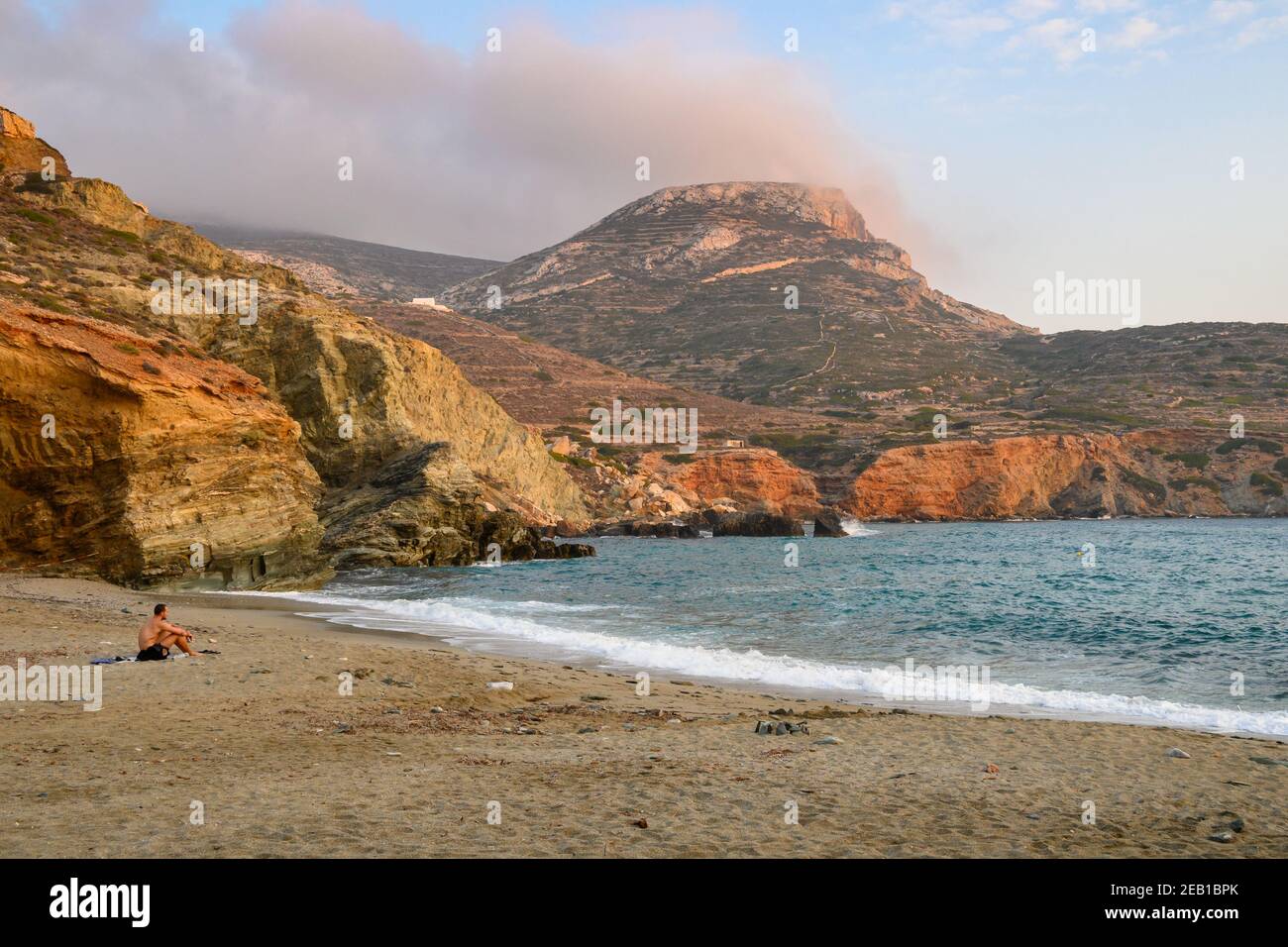 Folegandros, Greece - September 24, 2020: A tourists relaxing on the ...