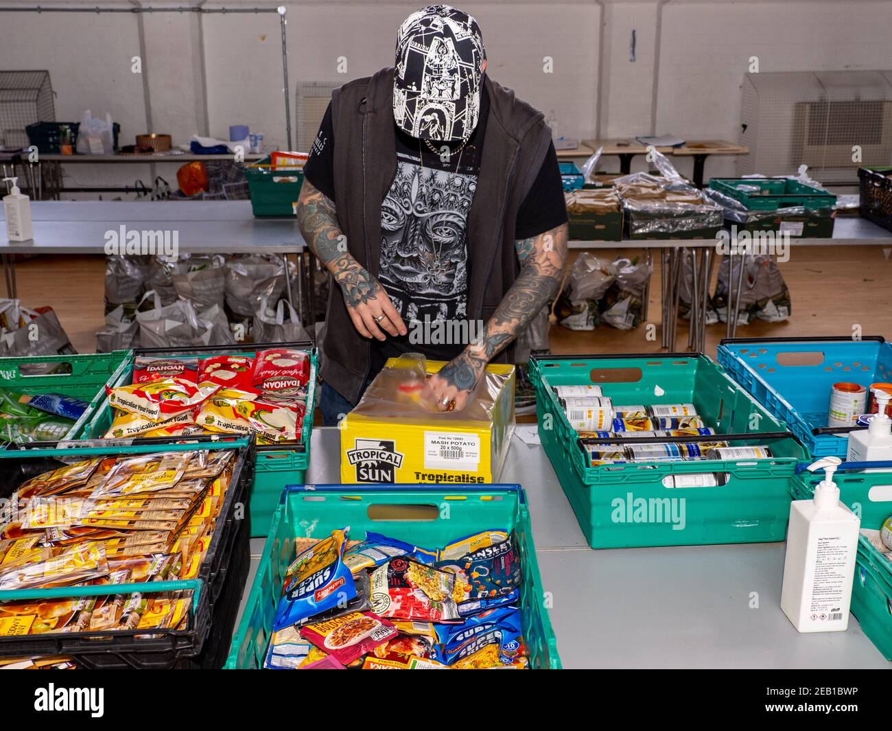 Volunteers sorting and packing produce at Bounds Green Food Bank in ...