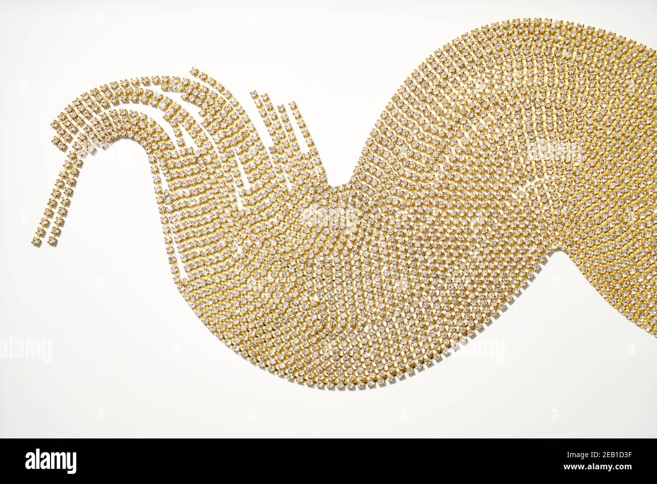 Strass strands on a white background, beautifully laid out in waves ...